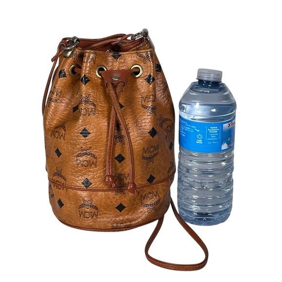 MCM | Bags | Mcm Cognac Leather Bucket Bag Mini Drawstring Brown Black ...